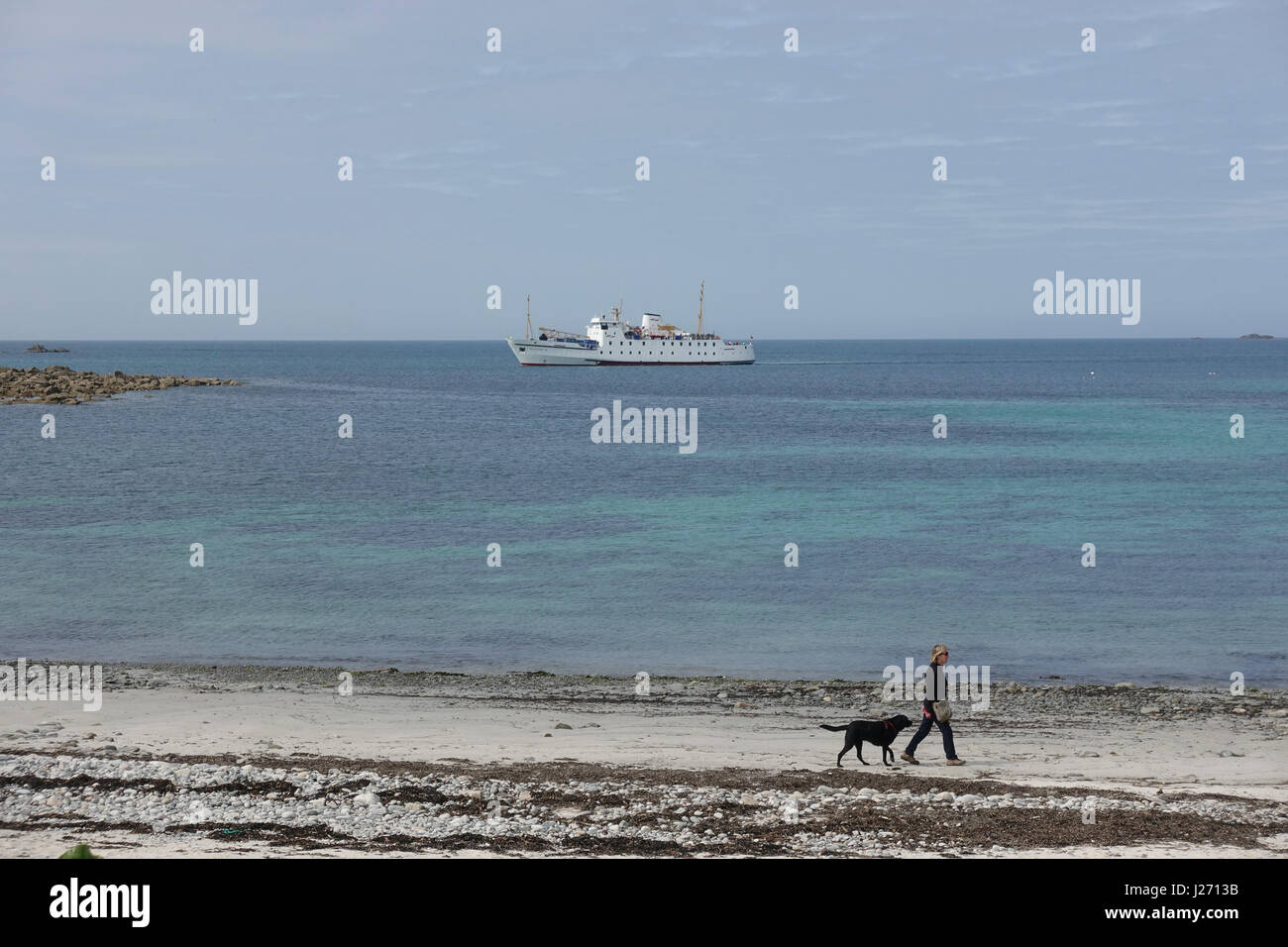 Isles of scilly ferry st marys quay woman dog walker hi-res stock ...