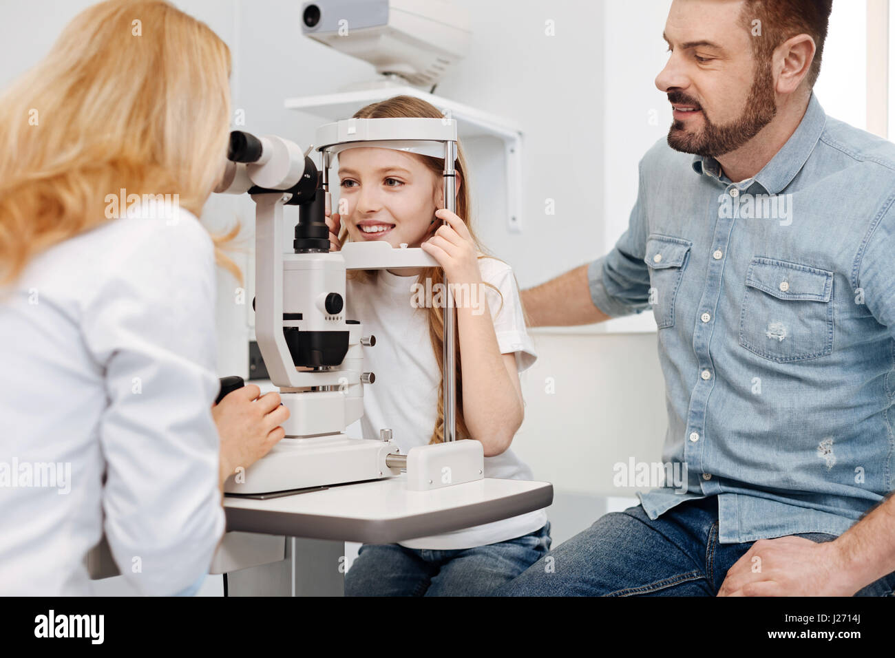 Caring handsome dad supporting his child Stock Photo - Alamy