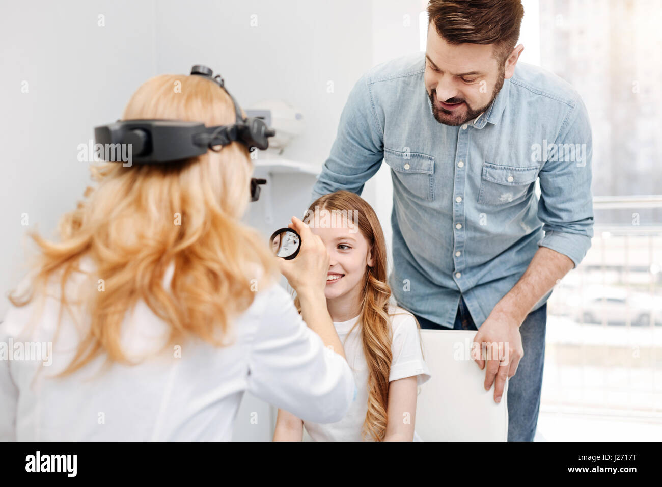 Qualified expert conducting diagnostic procedure Stock Photo - Alamy