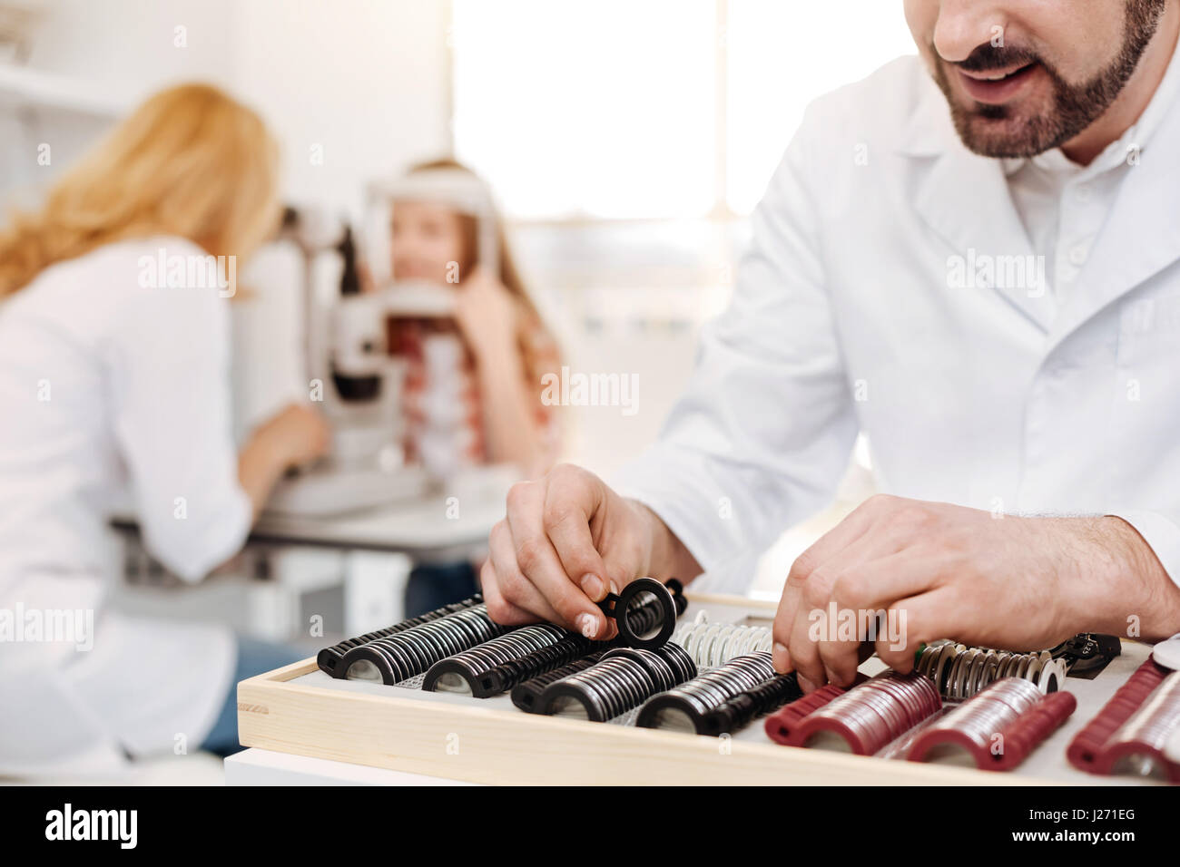 Professional ophthalmologist ordering the lenses in spectacle box Stock ...