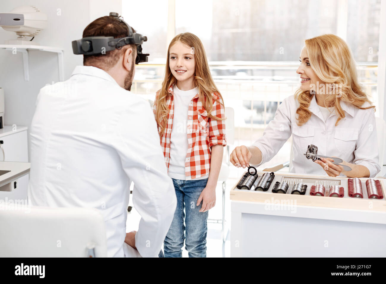Friendly wonderful ophthalmologist giving his patient advice Stock ... Friendly wonderful ophthalmologist giving his patient advice Stock ...