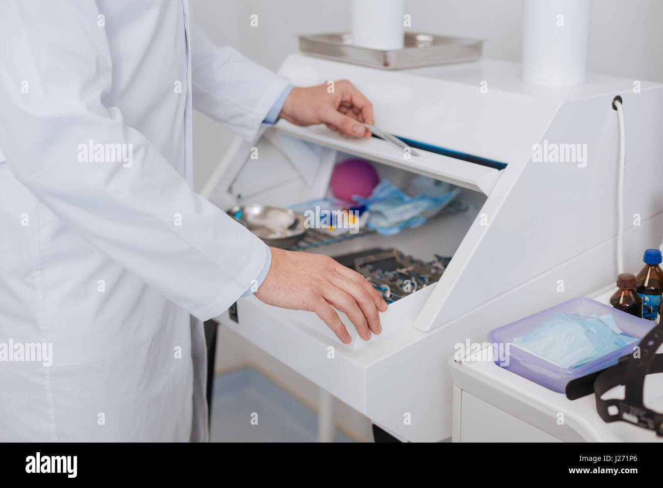 Male person opening special box Stock Photo - Alamy
