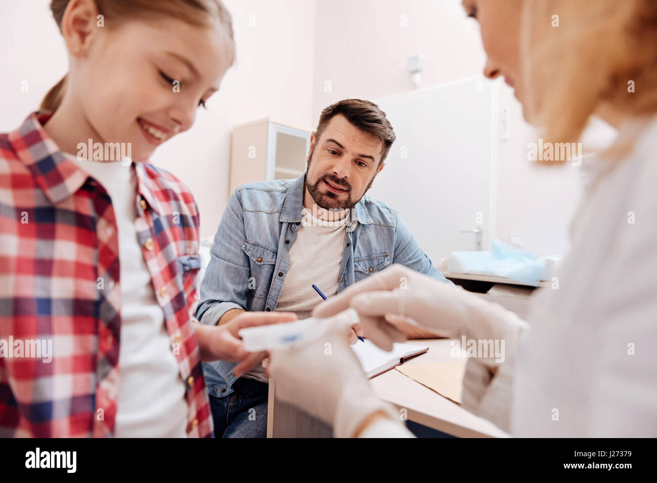Serious doctor explaining the instruction Stock Photo - Alamy