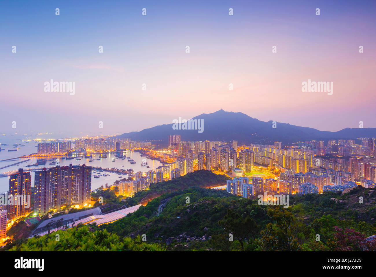 Hong Kong Tuen Mun downtown at sunset Stock Photo - Alamy