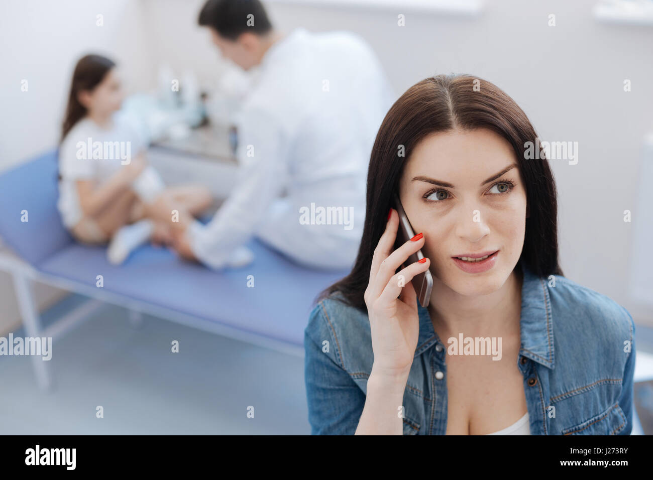 Patient phone injury talking hi-res stock photography and images - Alamy