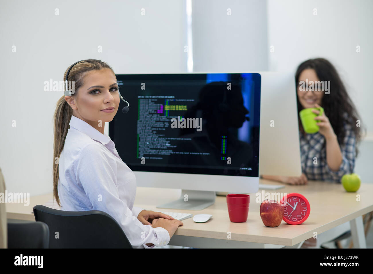 Multiethnic group of happy business people working with laptop computer ...