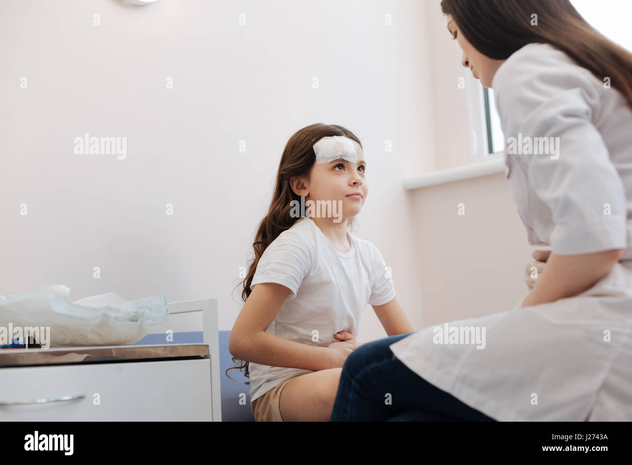 Girl having medical examination hi-res stock photography and images - Alamy