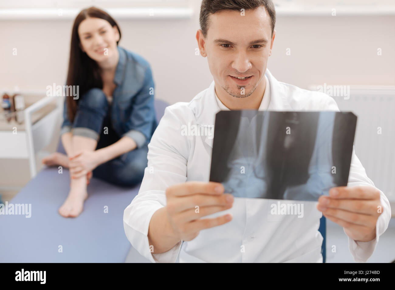 Delighted positive doctor having good news Stock Photo - Alamy