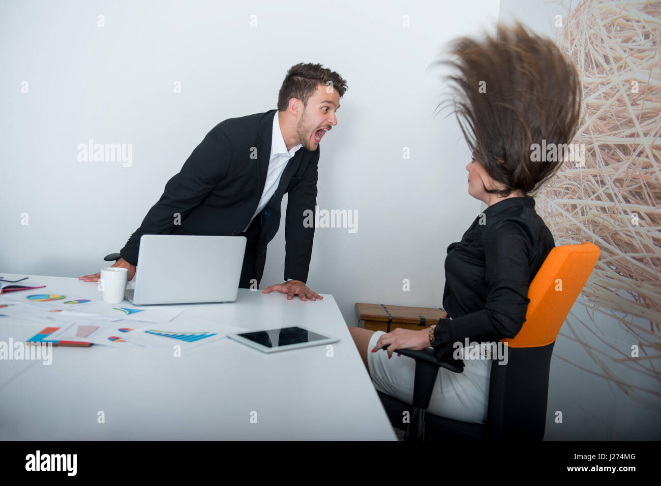 People Arguing At Work