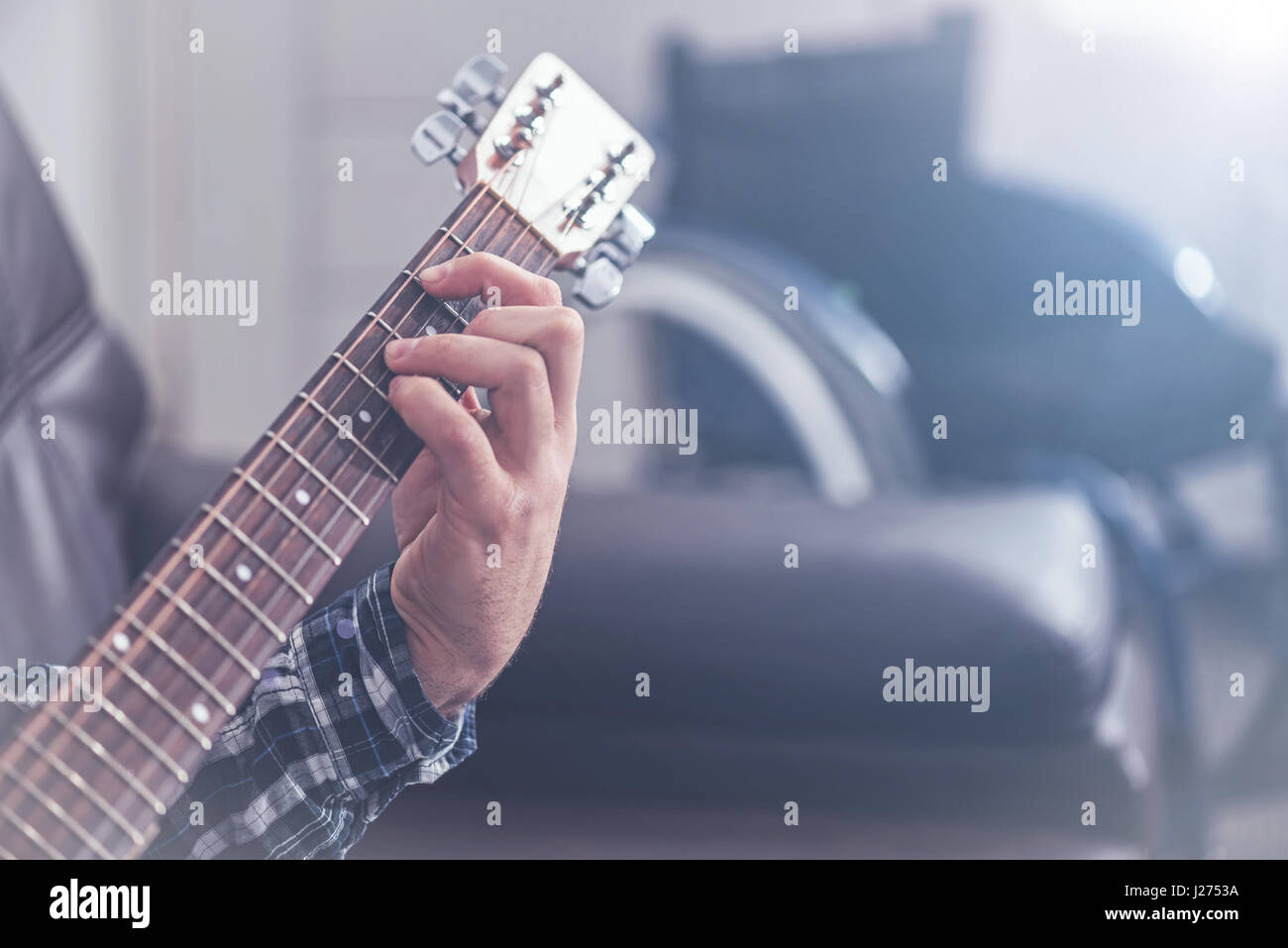 Gifted young handicap playing musical instrument indoors Stock Photo ...