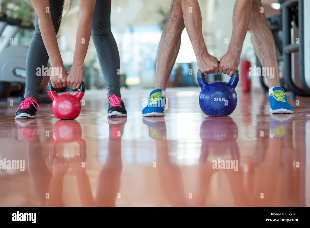 Fit people working out in fitness class at the gym Stock Photo - Alamy