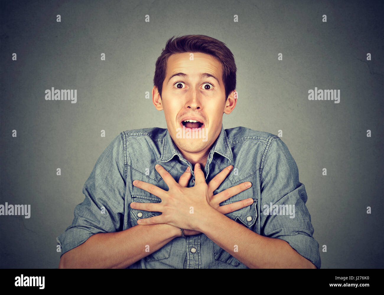portrait of surprised young man Stock Photo - Alamy