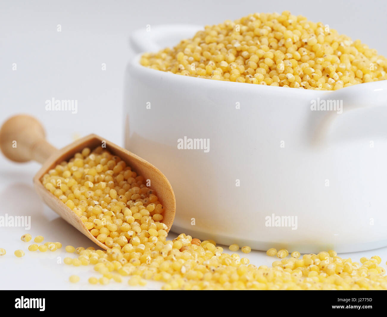 Millet on the white background Stock Photo - Alamy