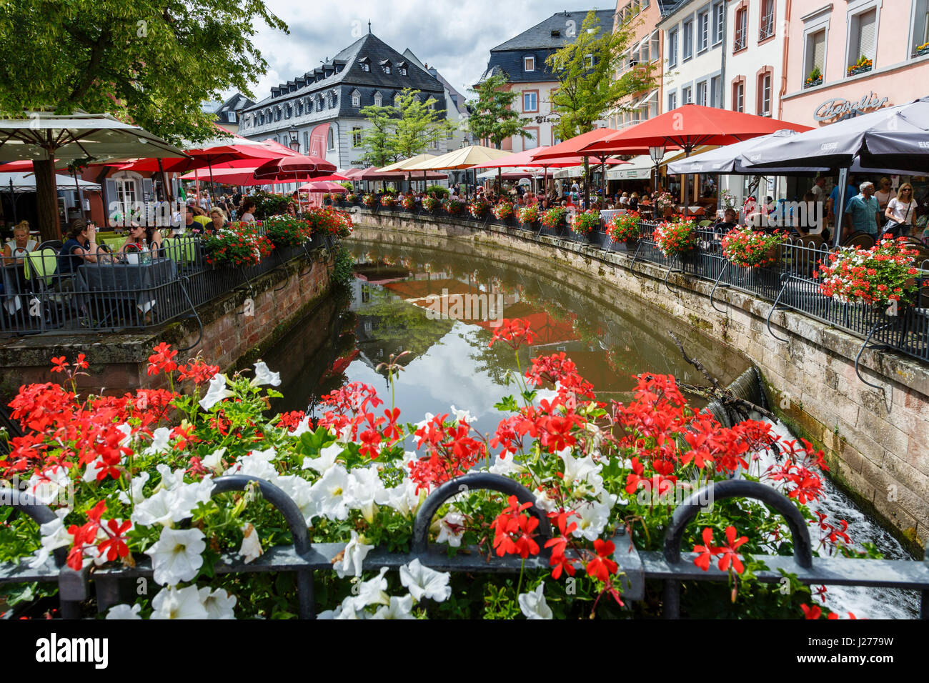 The River Leuk lined with restaurants in Saarburg, Germany Stock Photo ...