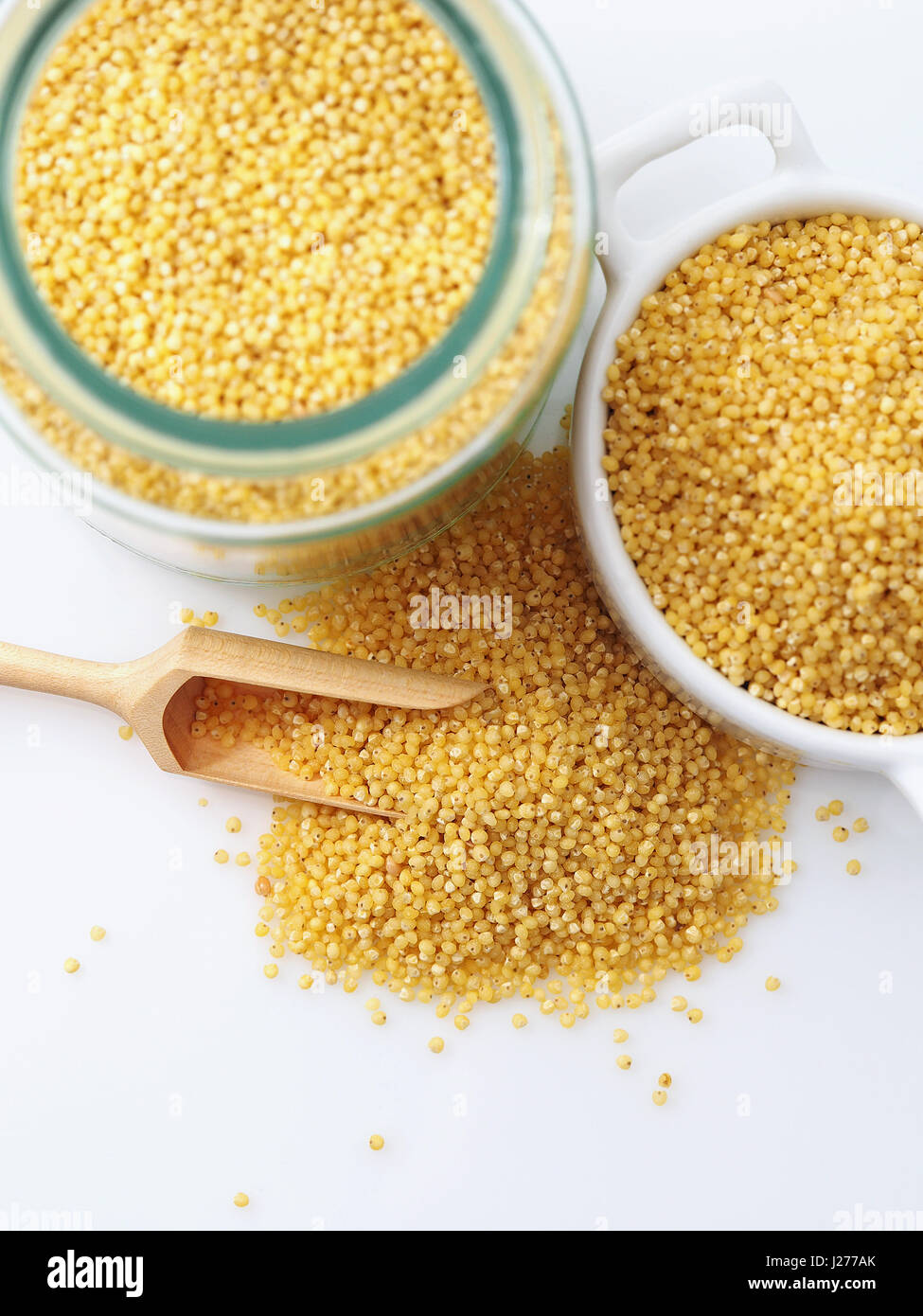 Millet on the white background Stock Photo - Alamy