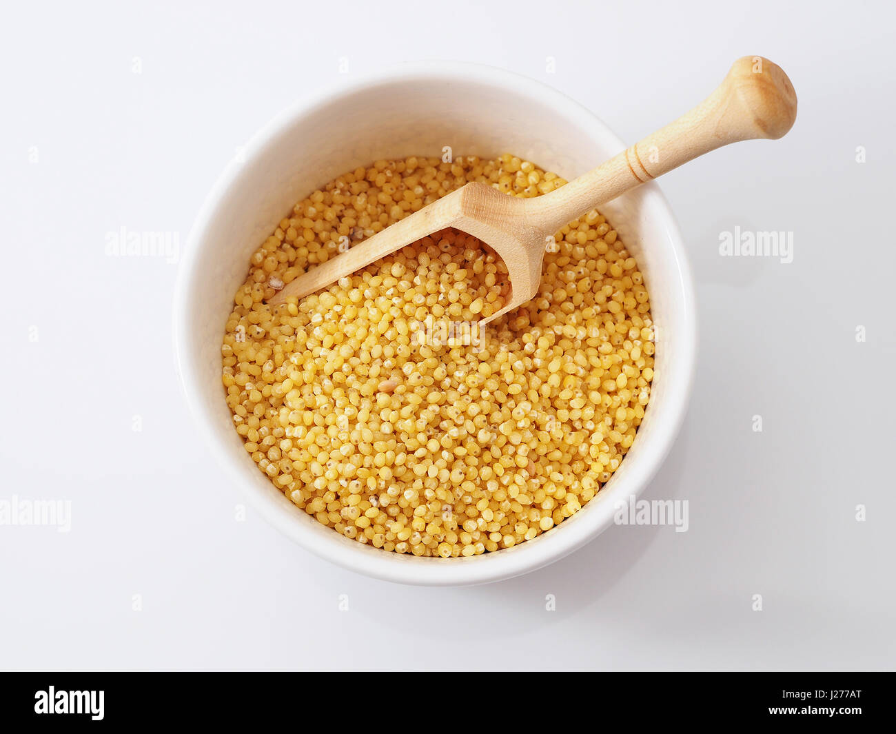 Millet on the white background Stock Photo - Alamy