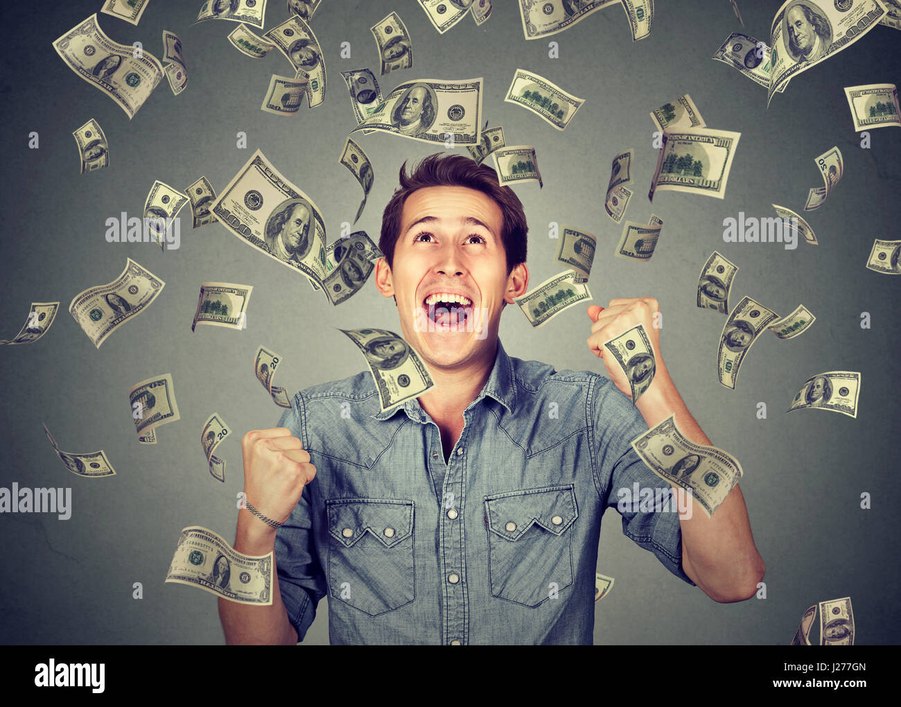 Happy young man screaming super excited. Portrait ecstatic guy ...