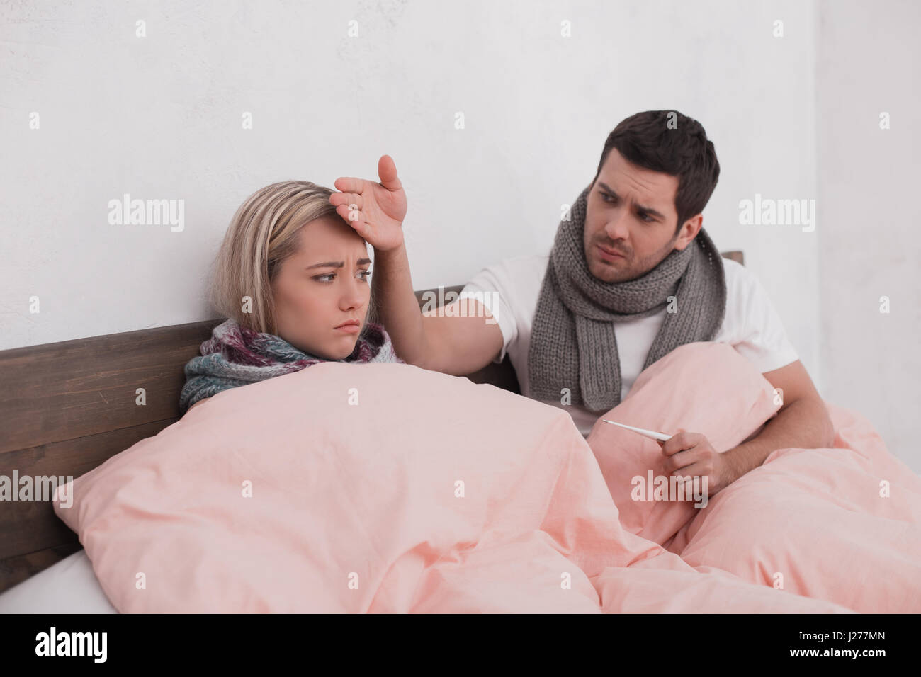 Sick Couple Together Feeling Unwell Concept Stock Photo - Alamy