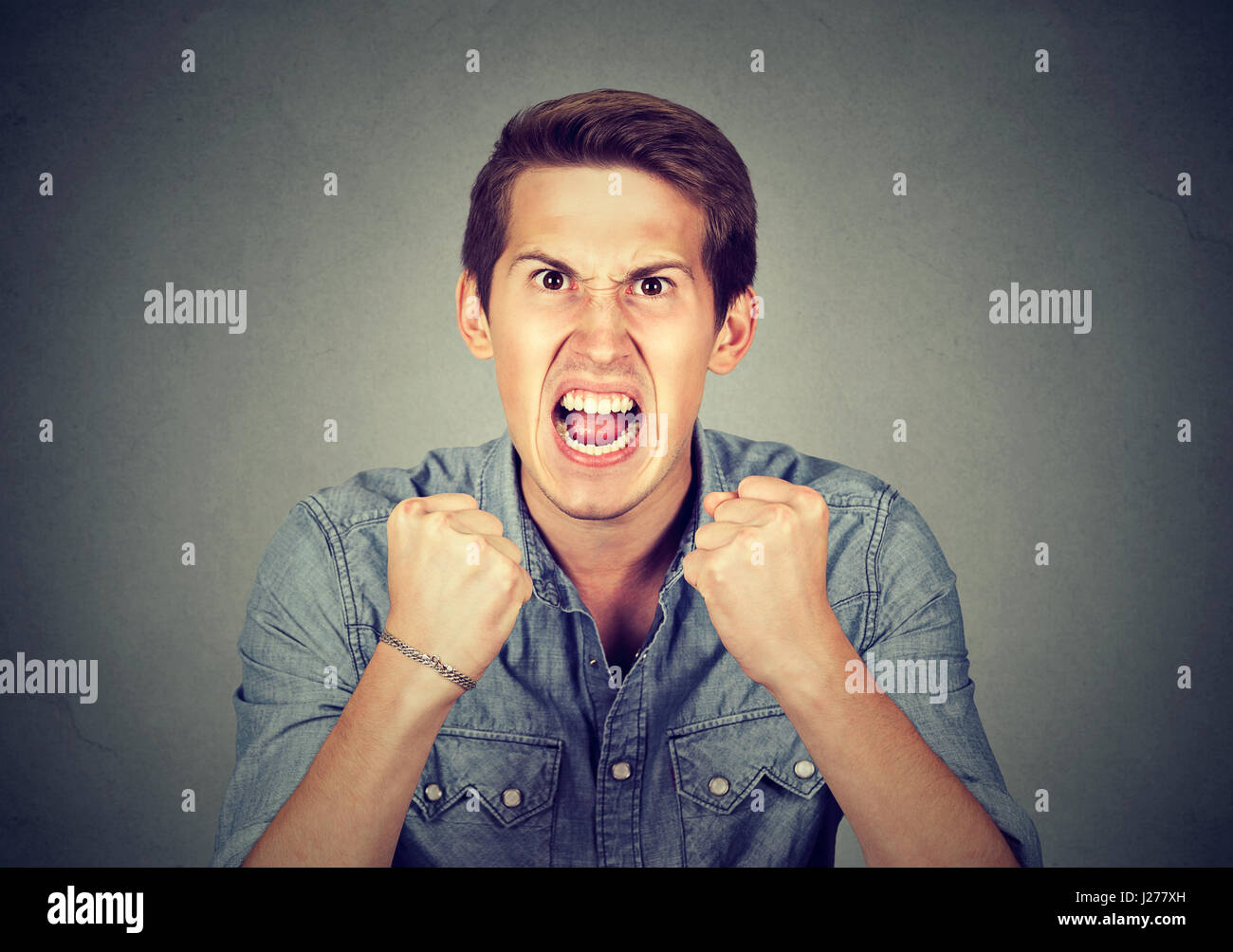 portrait of young angry man Stock Photo - Alamy