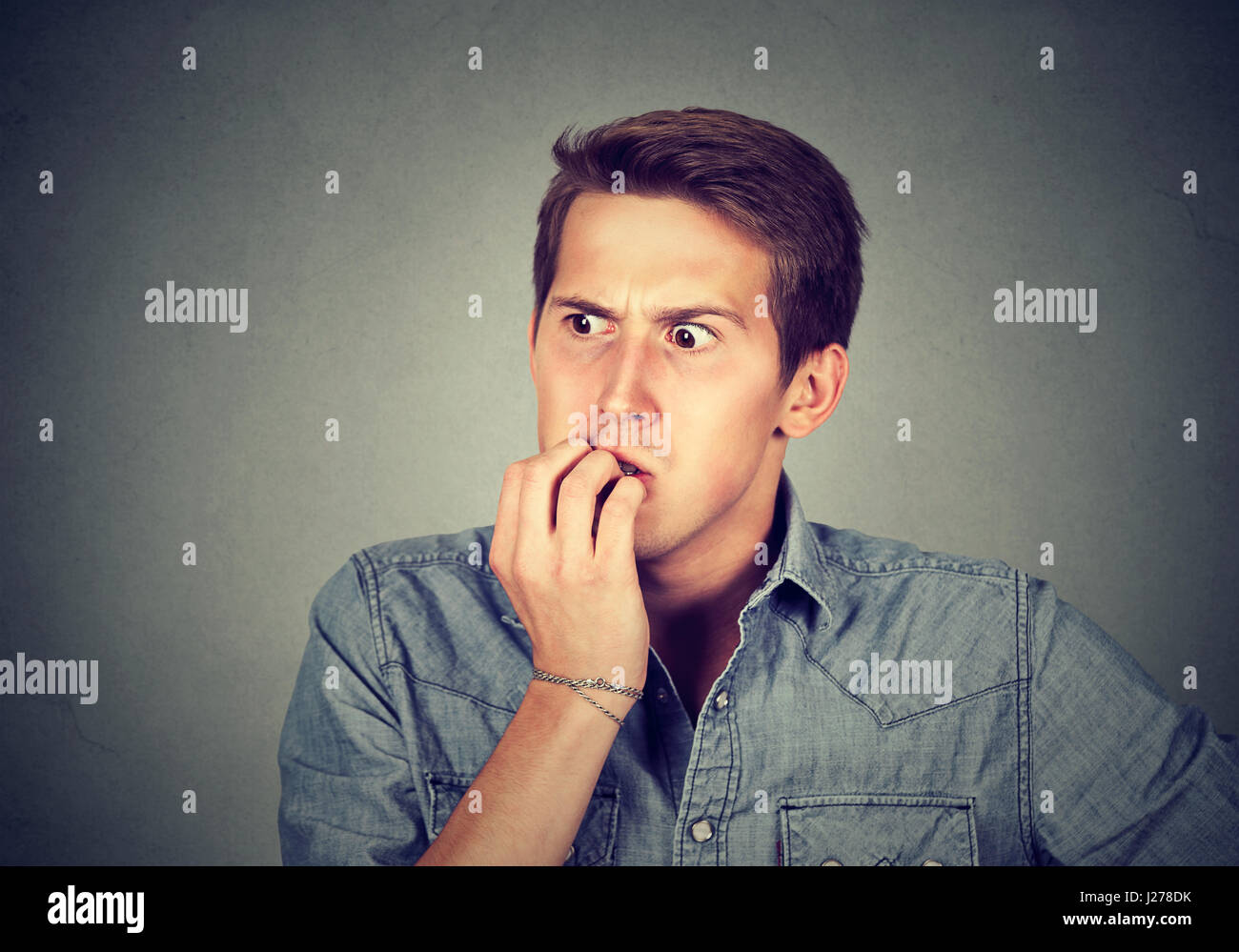Anxious stressed young man looking away Stock Photo - Alamy Anxious stressed young man looking away Stock Photo - Alamy