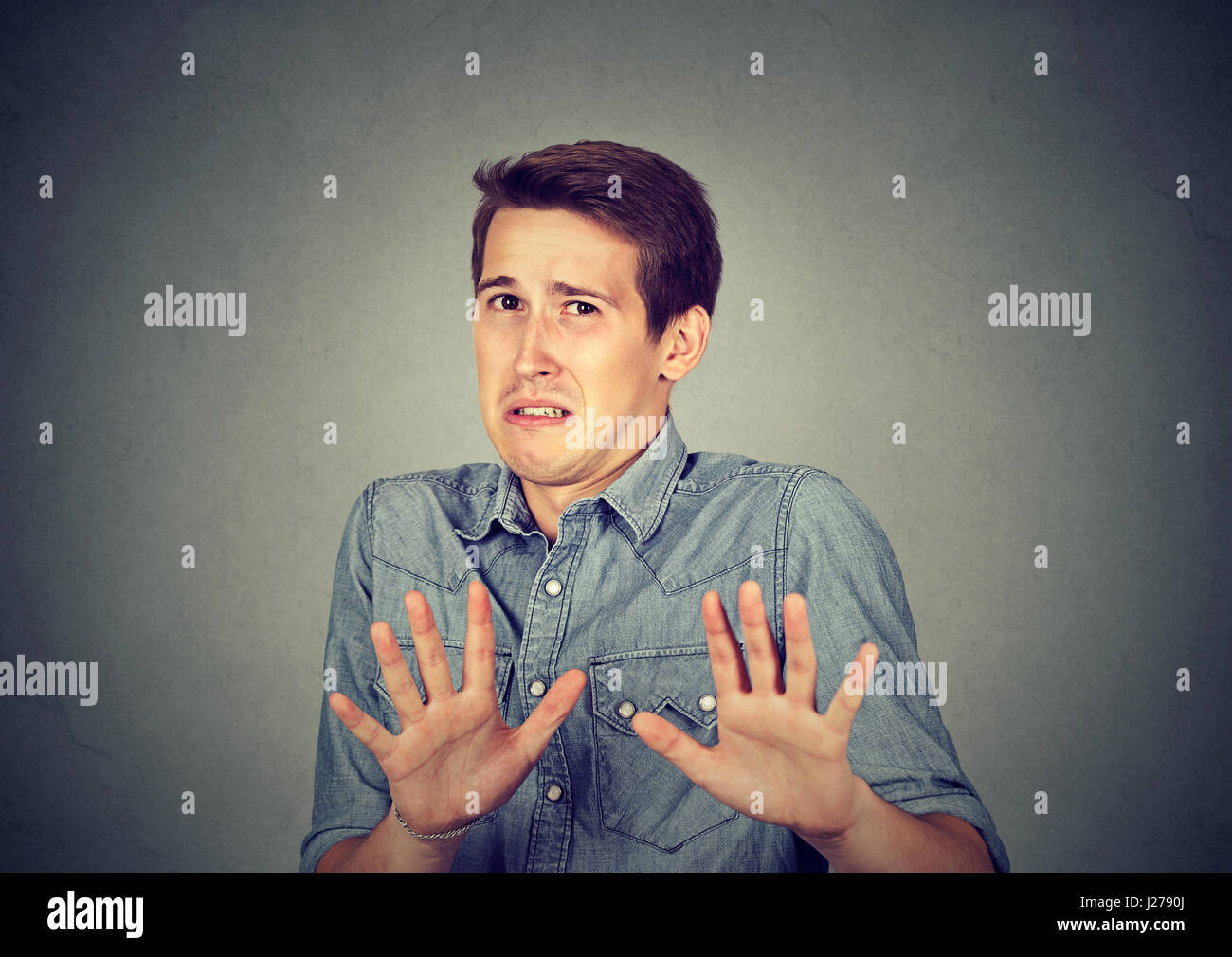 Portrait disgusted young man. Negative human emotion Stock Photo - Alamy