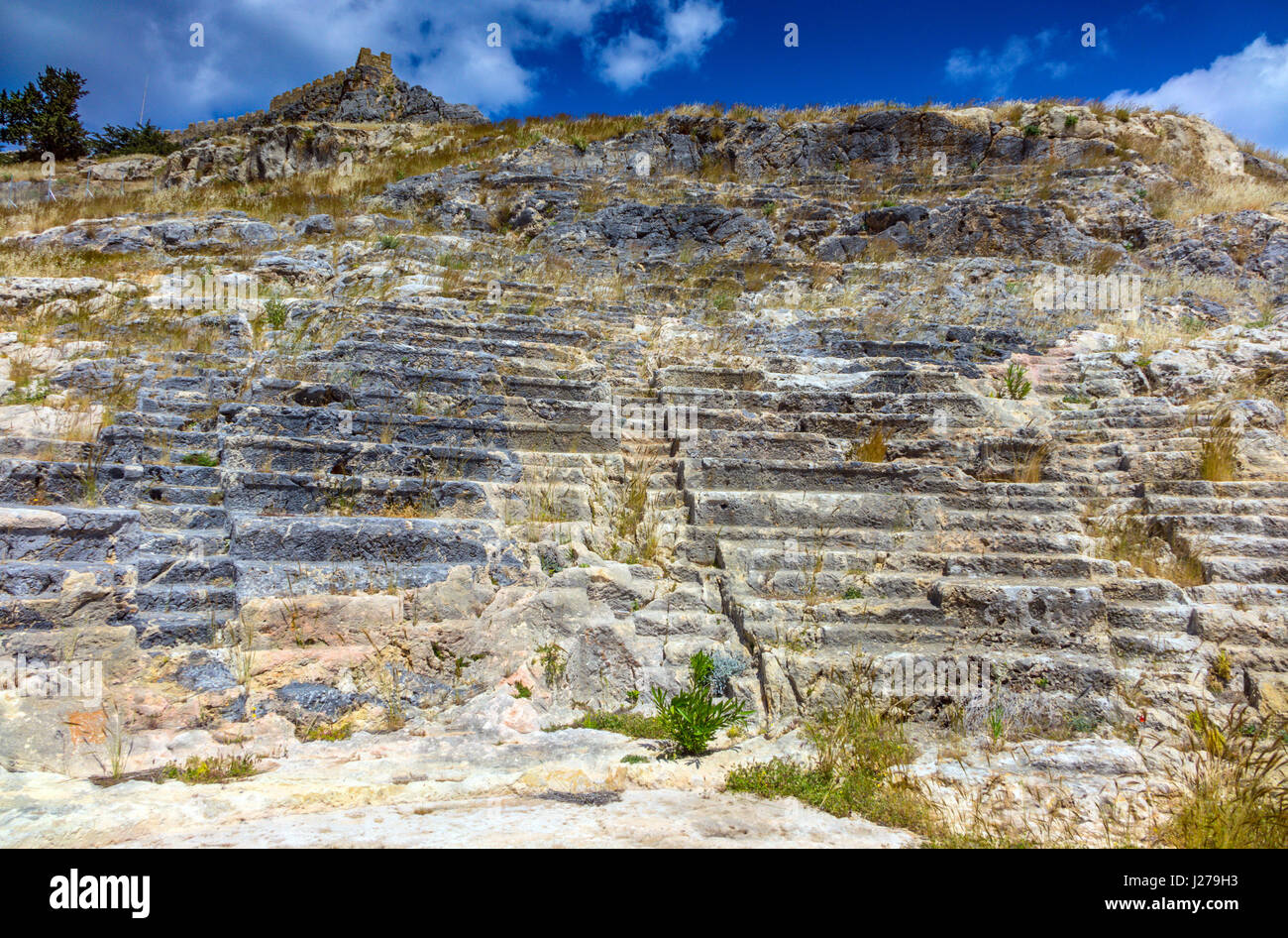 Ancient amphitheatre caved into rock, Lindos, Rhodes, Greece Stock ...