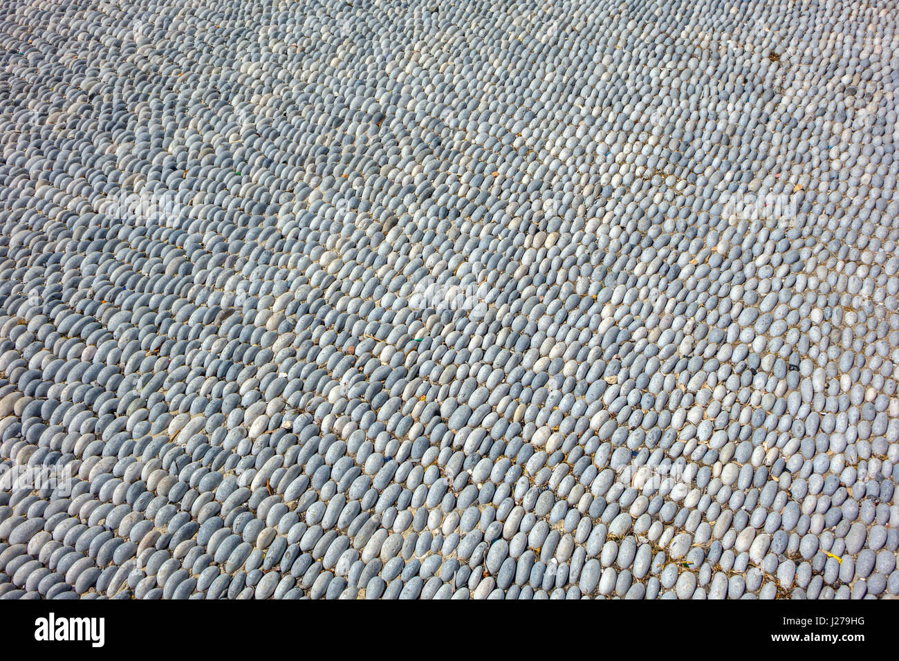Path made with small rounded pebbles Stock Photo - Alamy