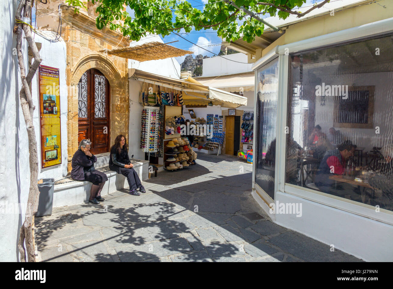 Narrow streets of Lindos, Rhodes, Greece Stock Photo - Alamy