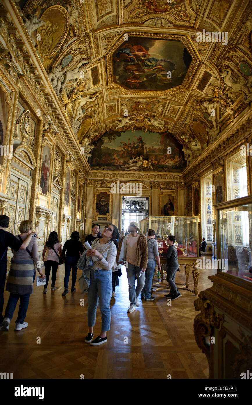 Visitors looking at the zodiac signs along the ceiling at the Apollo ...