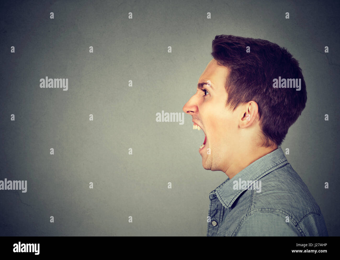 portrait of young angry man Stock Photo - Alamy