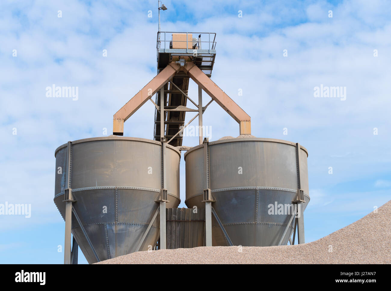 two large funnels at a cement factory Stock Photo - Alamy