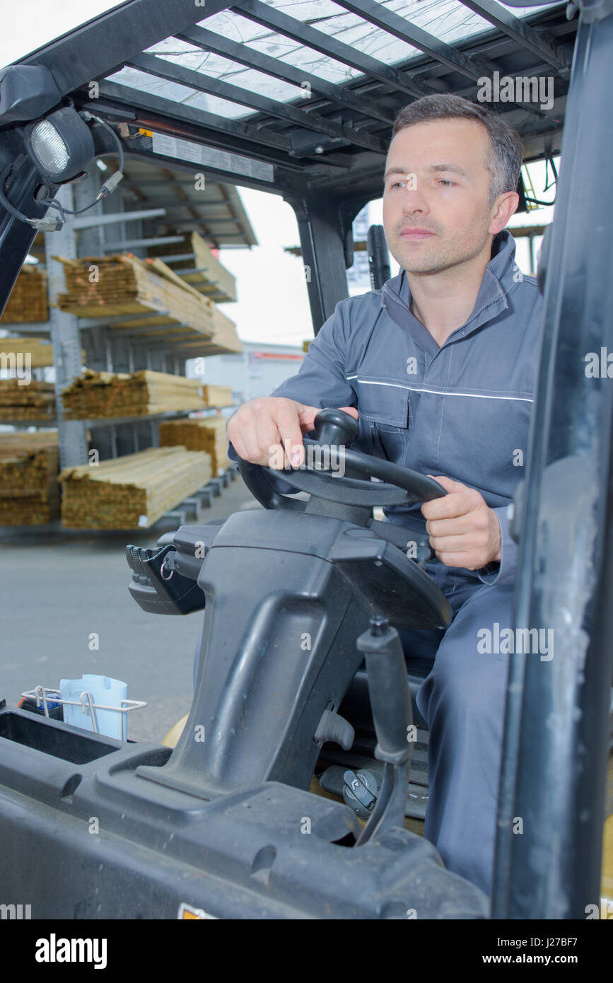 man on a heavy equipment Stock Photo - Alamy