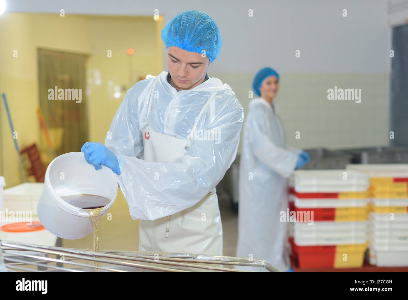 pouring the liquid content Stock Photo - Alamy