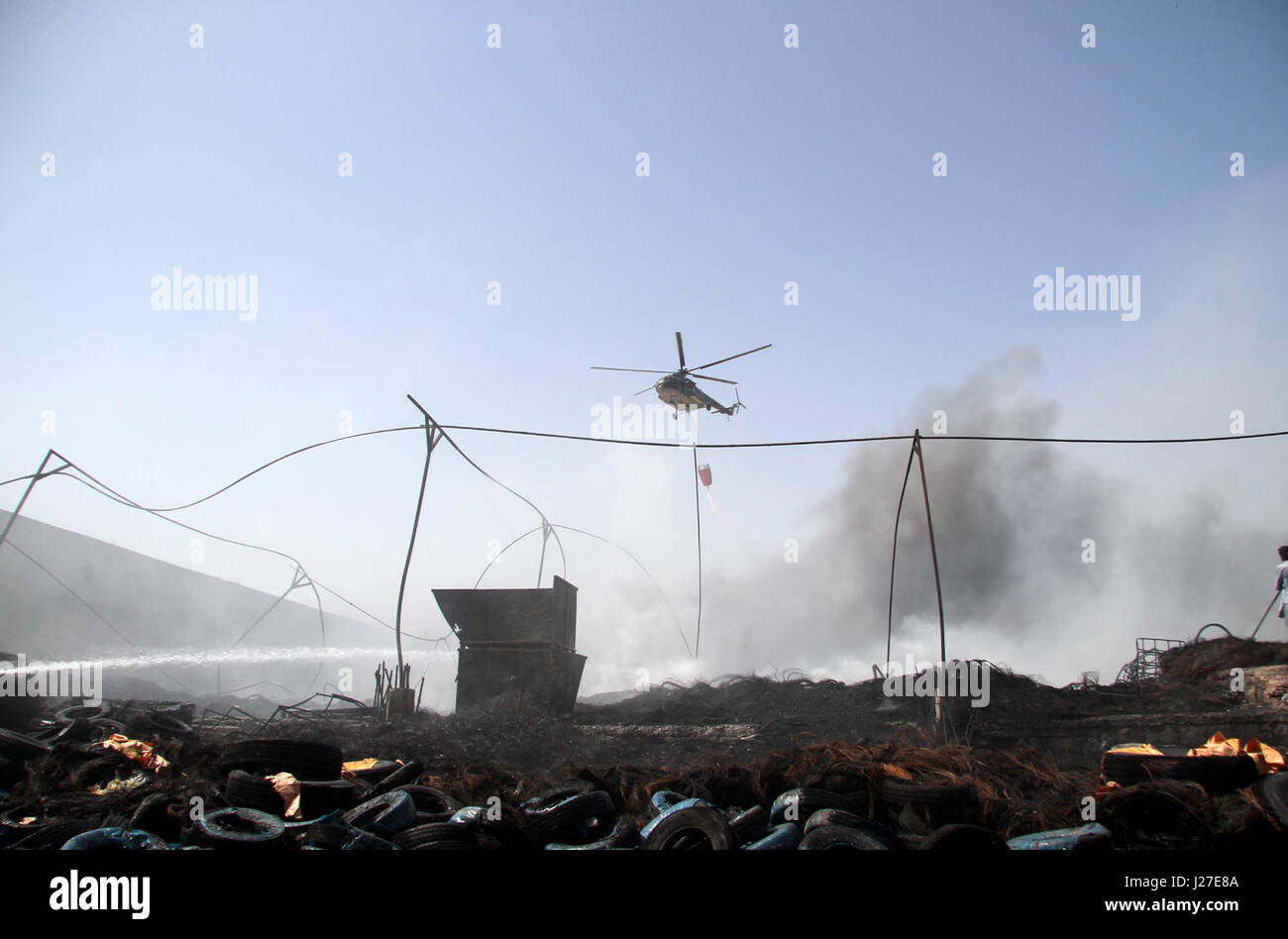 Karachi, Pakistan. 25th Apr, 2017. Views after fire erupted at tyre ...
