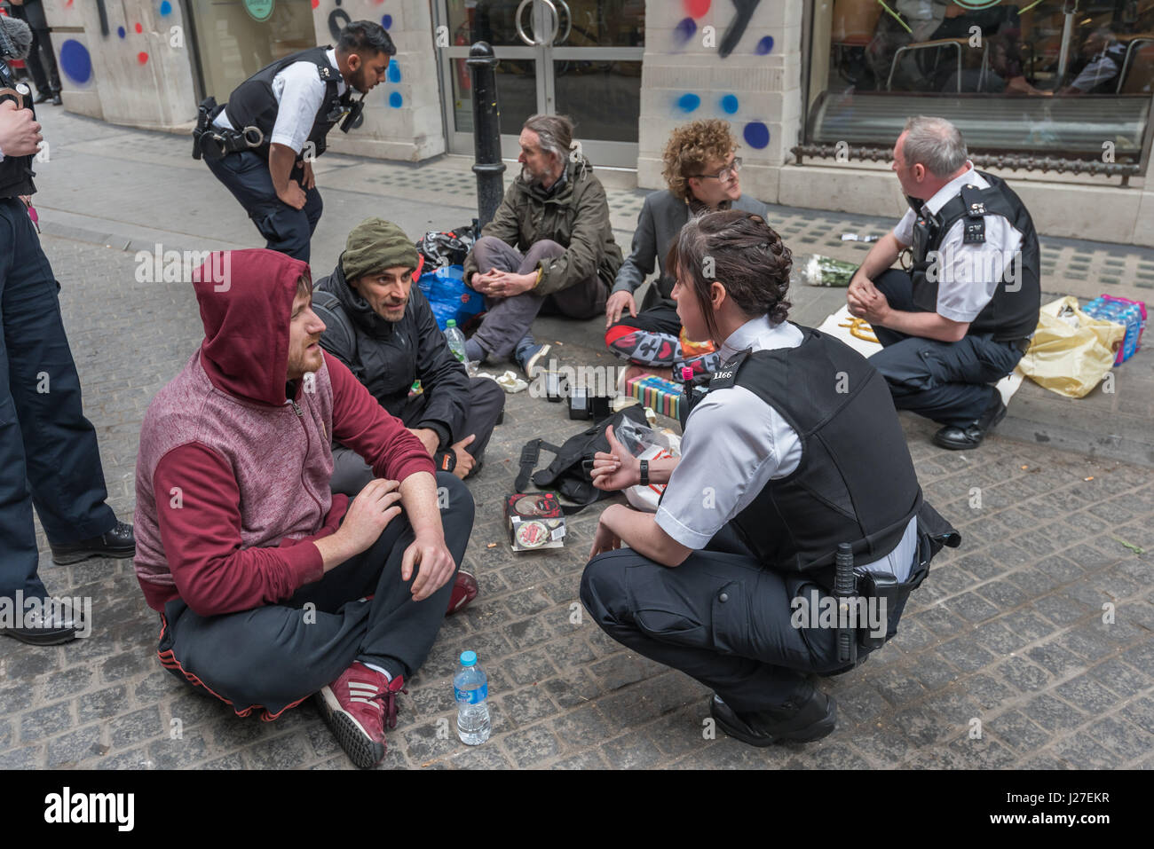 London, UK. 25th April 2017. Police talk with the campaigners who ...