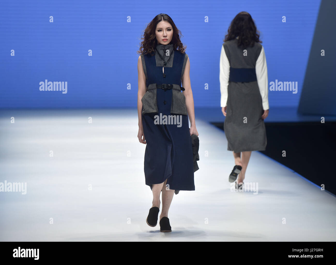 Shishi. 25th Apr, 2017. Models present jeans wear by Chinese designer ...
