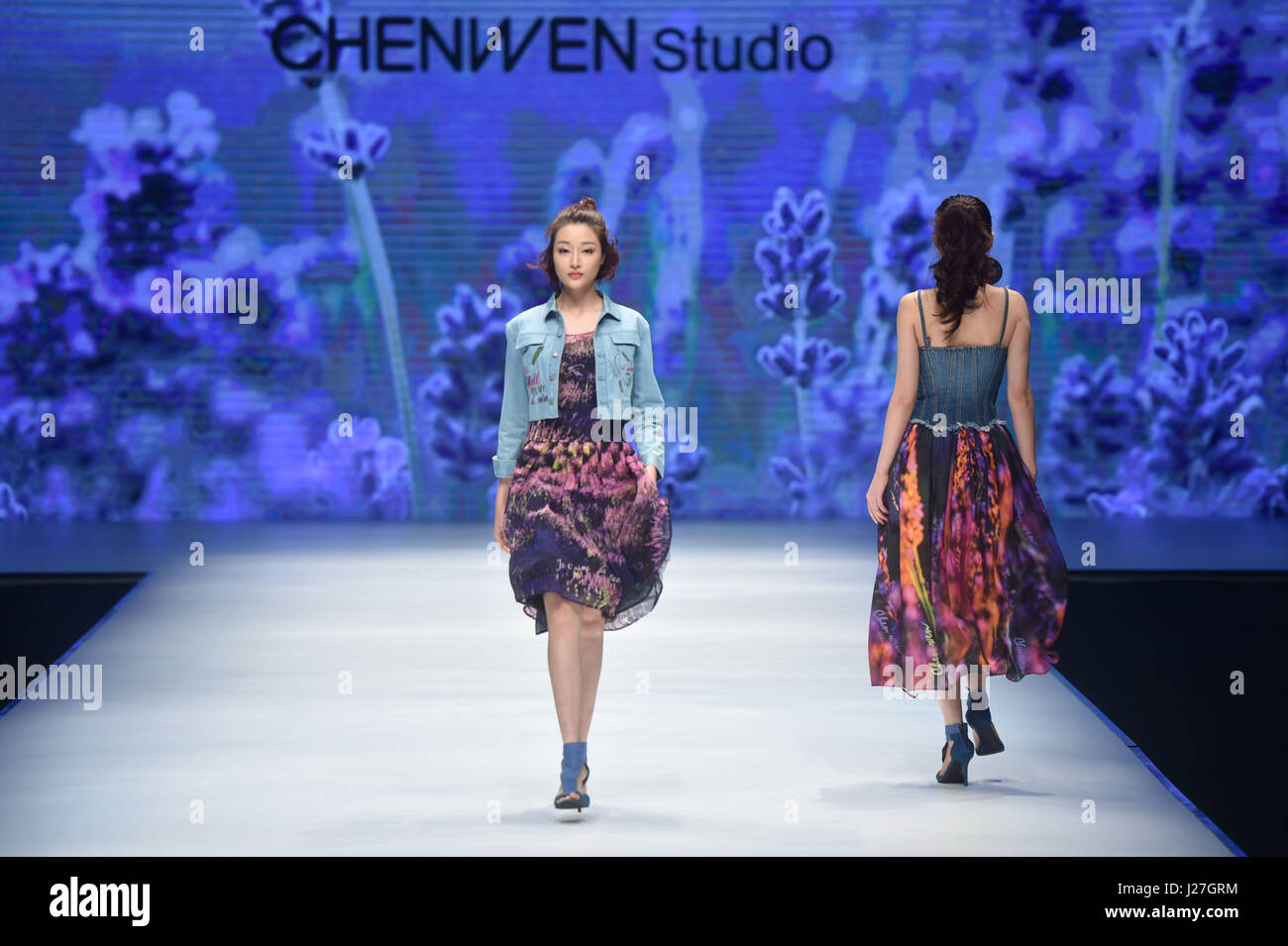 Shishi, China's Fujian Province. 25th Apr, 2017. Models present jeans ...