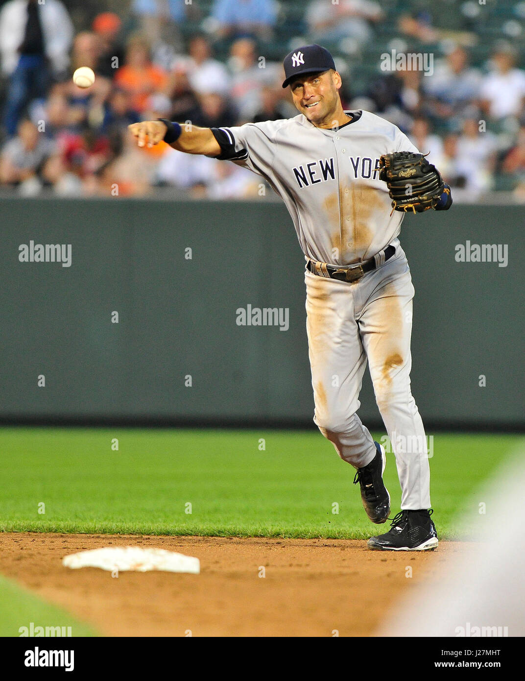 New York Yankees short stop Derek Jeter throws out Baltiomore Oriole ...