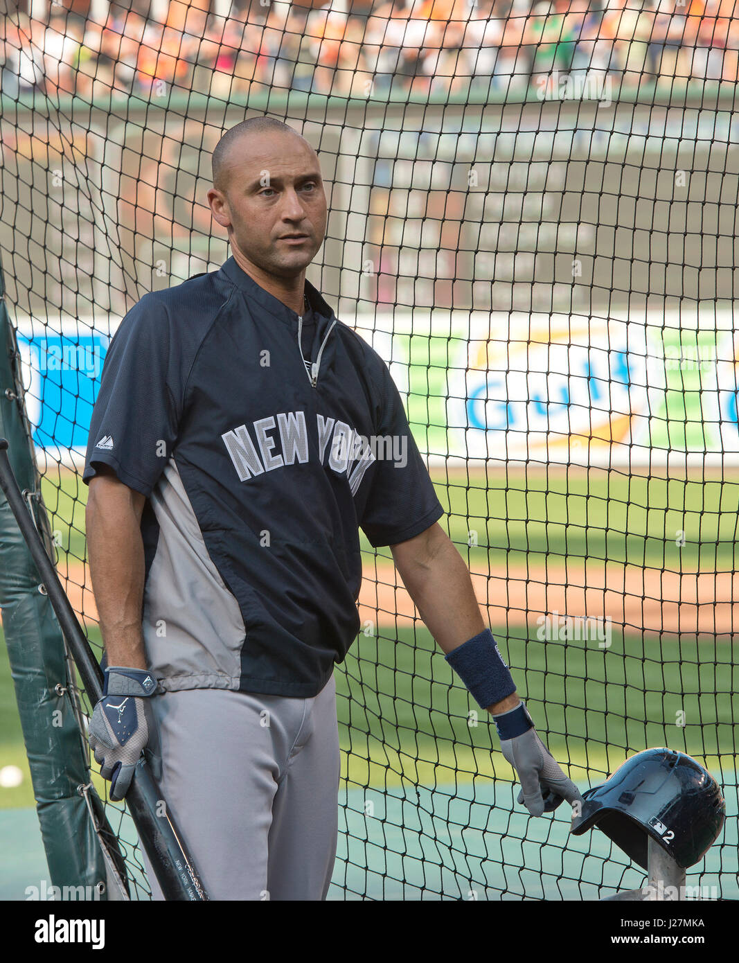 New York Yankees shortstop Derek Jeter (2) puts down his helmet after ...