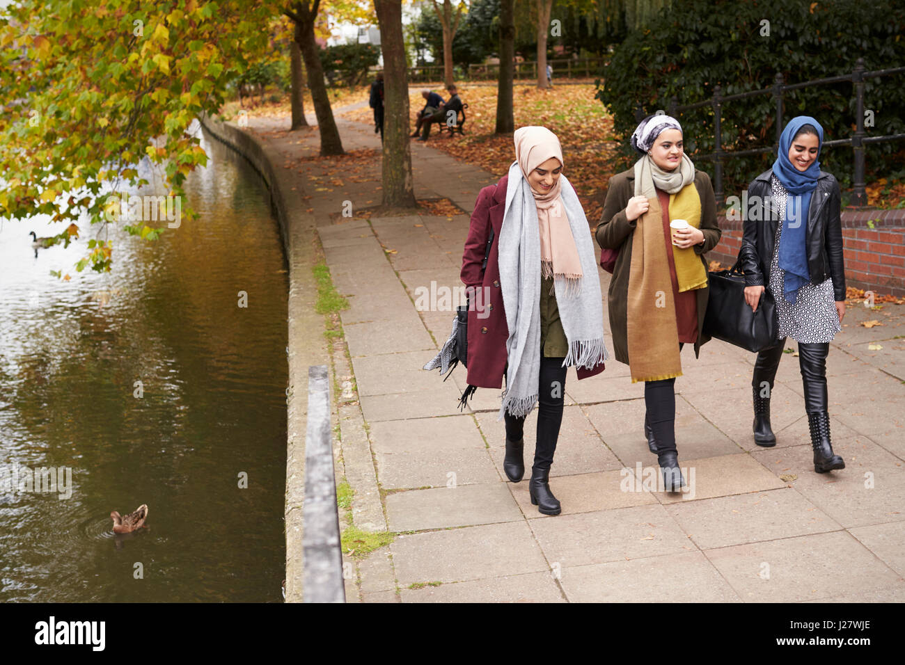 Muslim woman and british woman talking hi-res stock photography and ...