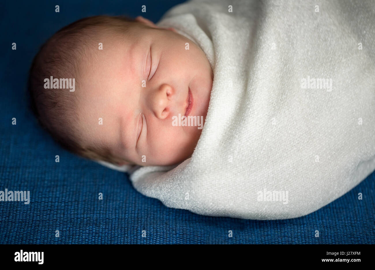 Adorable little baby sleeping and smiling, sweet dream Stock Photo - Alamy