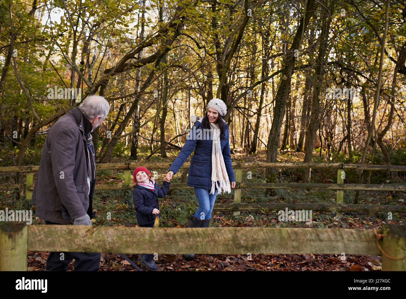 Multi Generation Family Enjoying Walk In Fall Landscape Stock Photo - Alamy