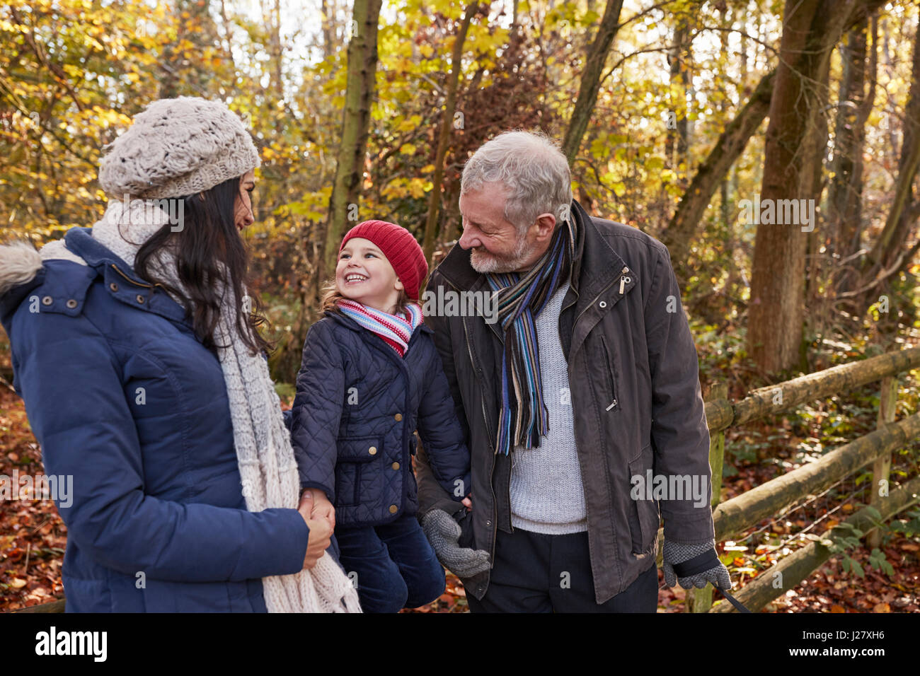 Multi Generation Family Enjoying Walk In Fall Landscape Stock Photo - Alamy