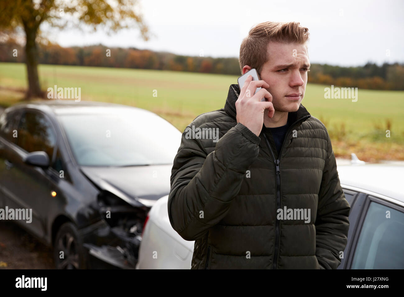 Man Calling To Report Car Accident On Country Road Stock Photo - Alamy