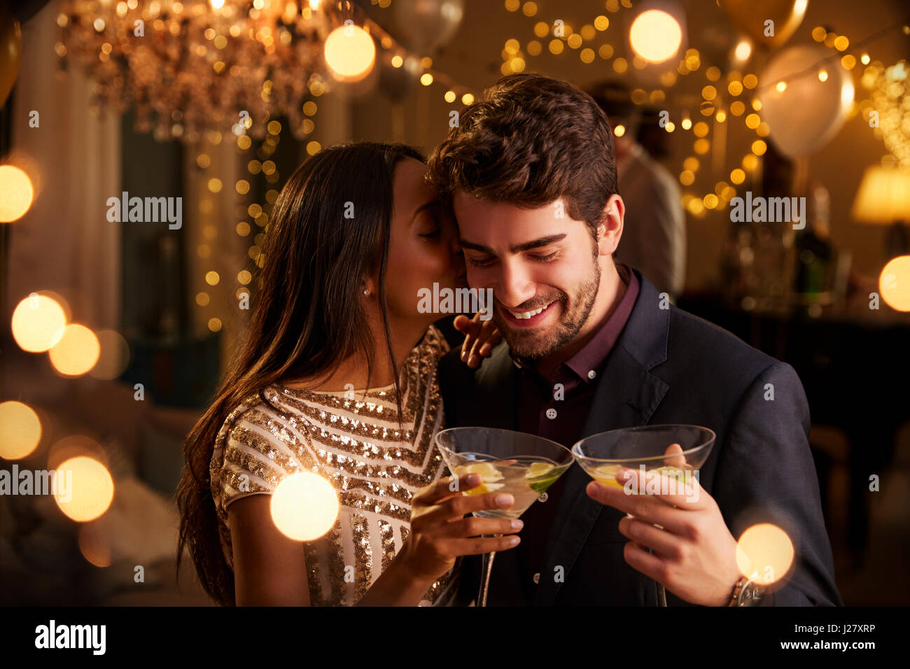 Romantic Couple Enjoying Cocktail Party Together Stock Photo - Alamy