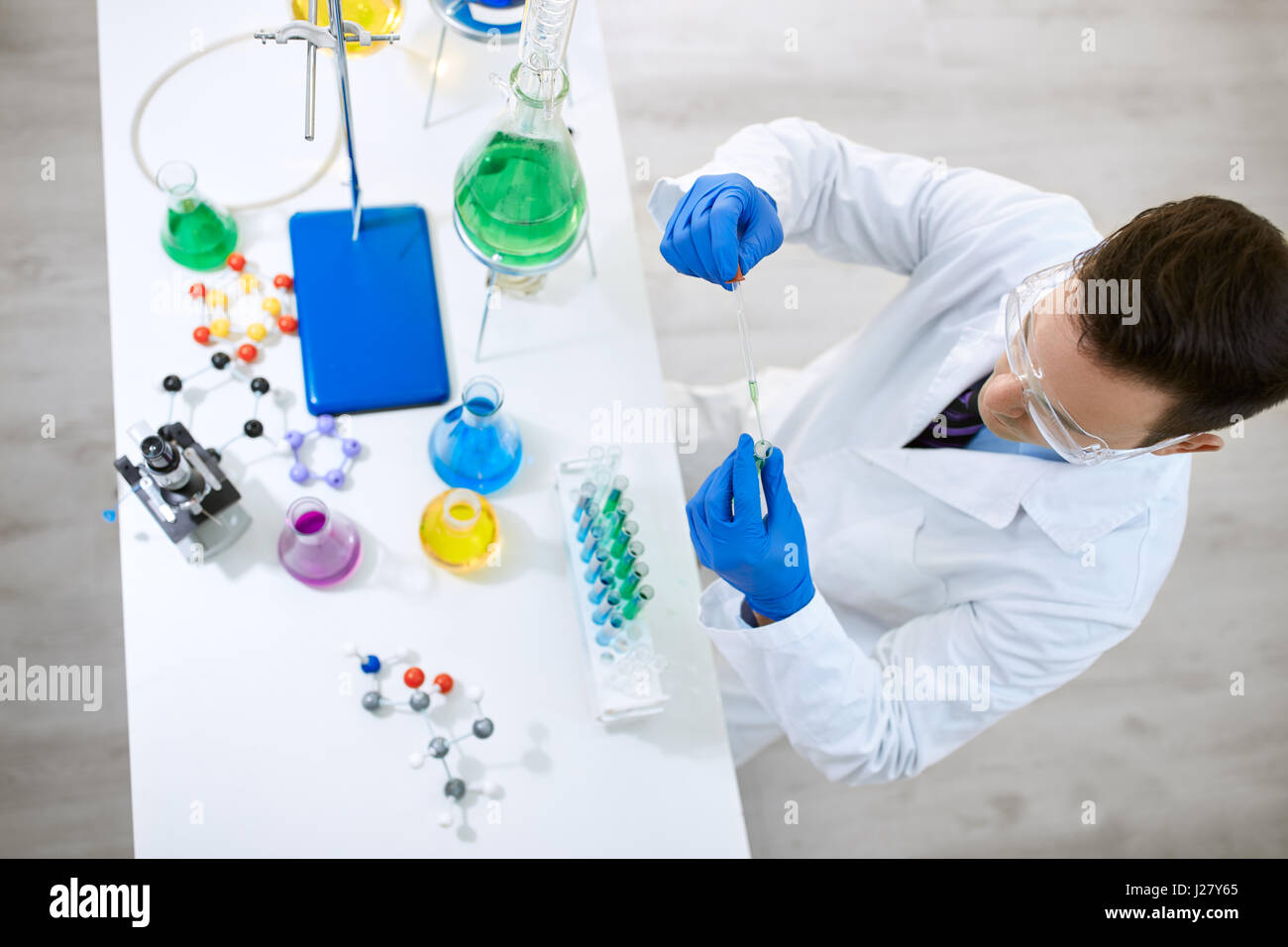 chemical experiment by science method top view Stock Photo - Alamy