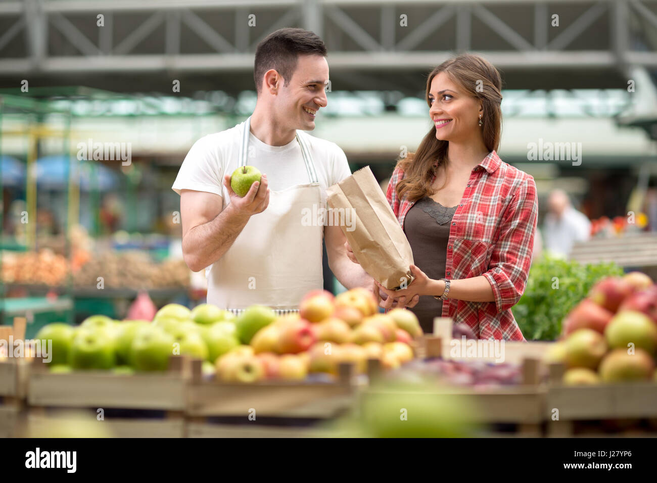 smile salesman presentation produces at the market Stock Photo - Alamy