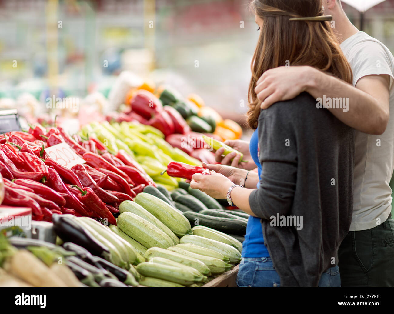 Couple shopping organic fruits and vegetables at the market Stock Photo ...