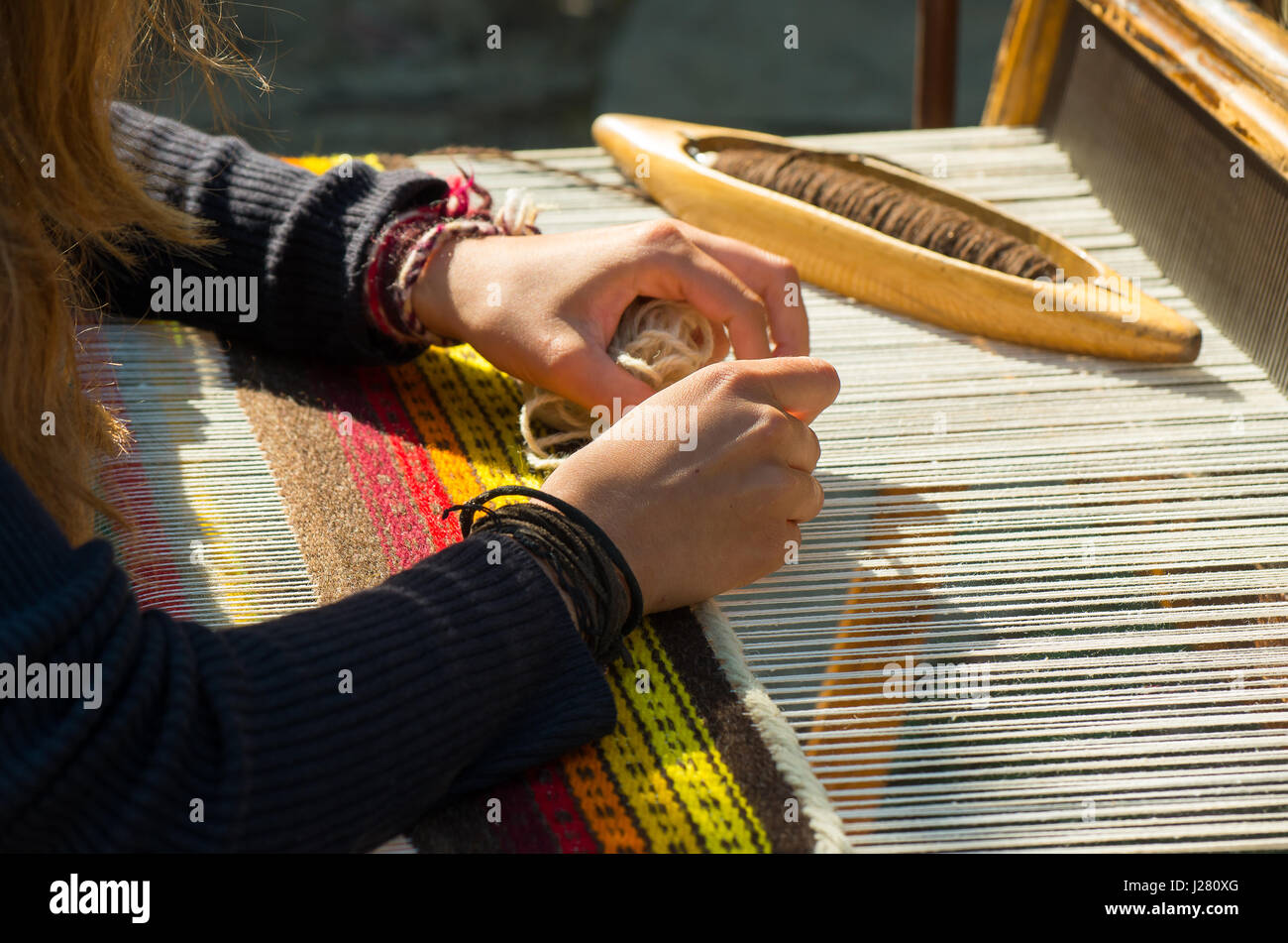 Crafts. Hand weaving loom with many colorful woolen threads Stock Photo ...