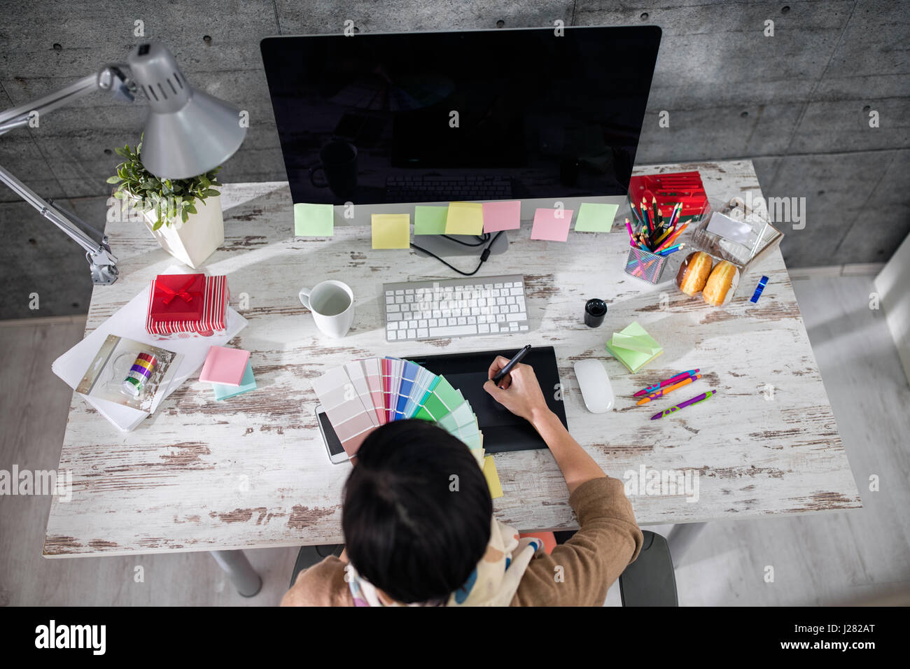 freelance designer choose color for patterns Stock Photo - Alamy